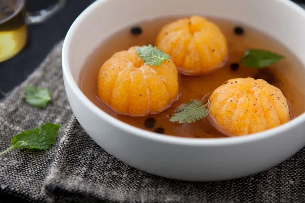 Recette Mandarine pochée entière à la mélisse